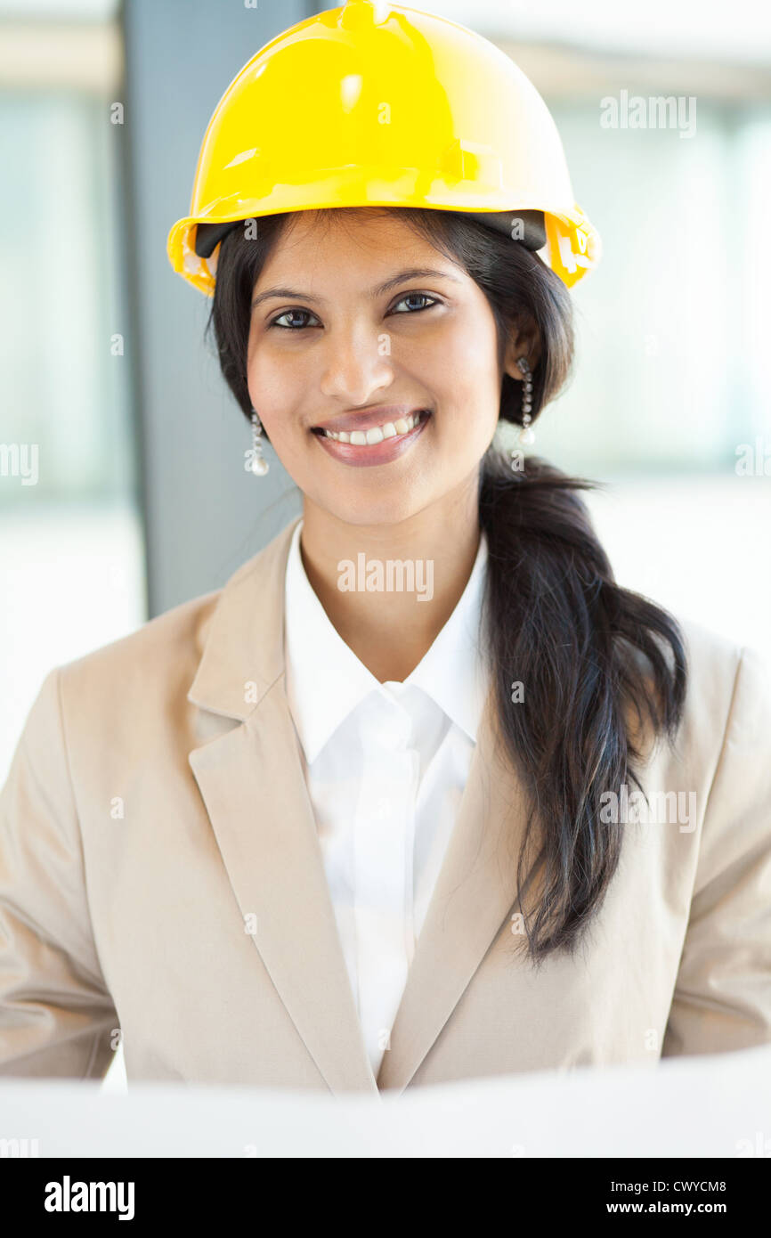 pretty young female construction worker in office Stock Photo - Alamy