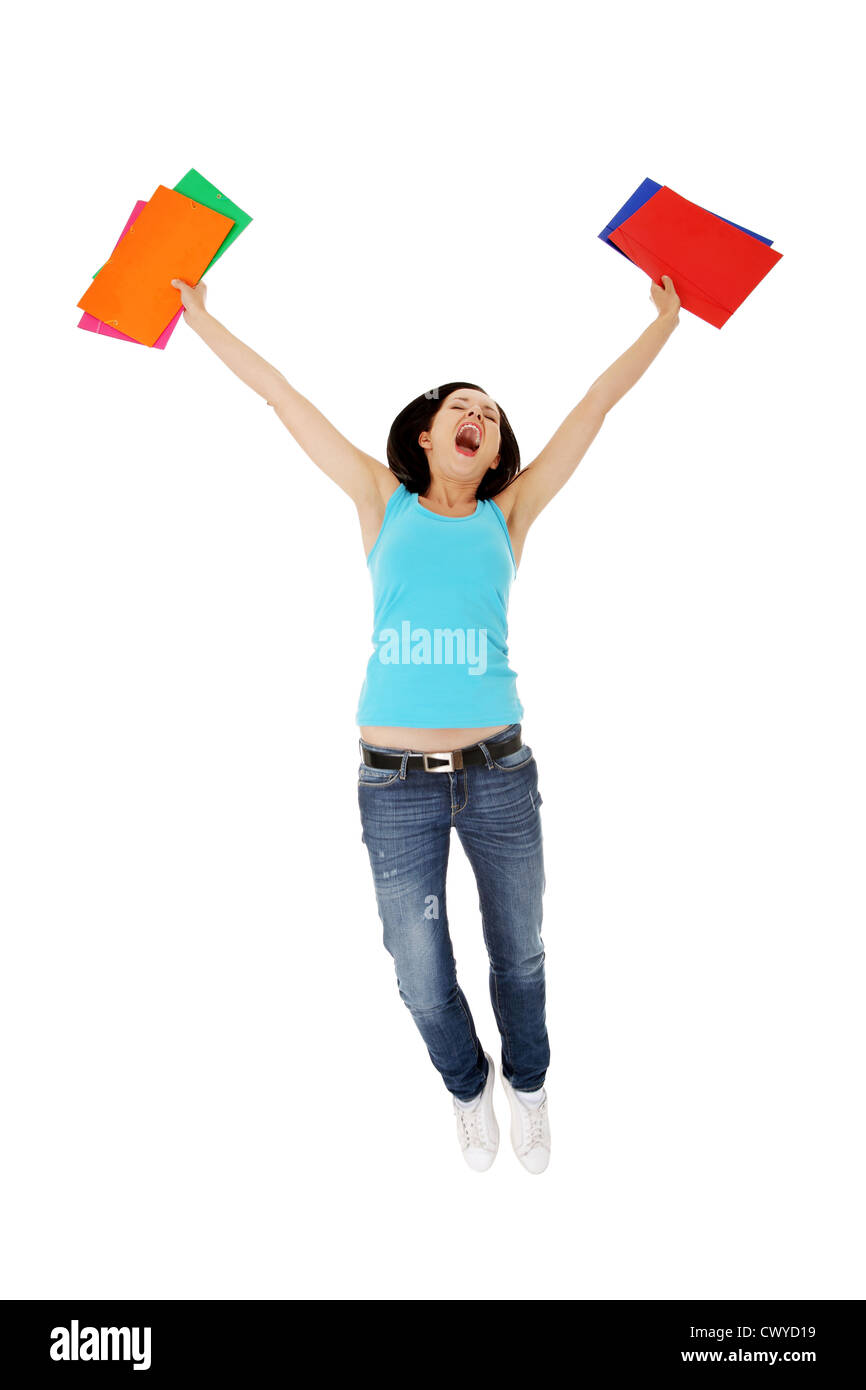 Jumping student girl, isolated on white background Stock Photo - Alamy