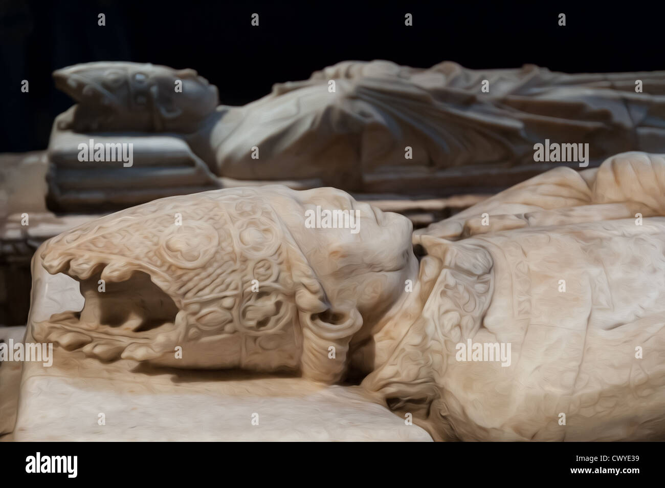 Laying statues inside tomb of old church in Toledo, Spain. Medieval ...