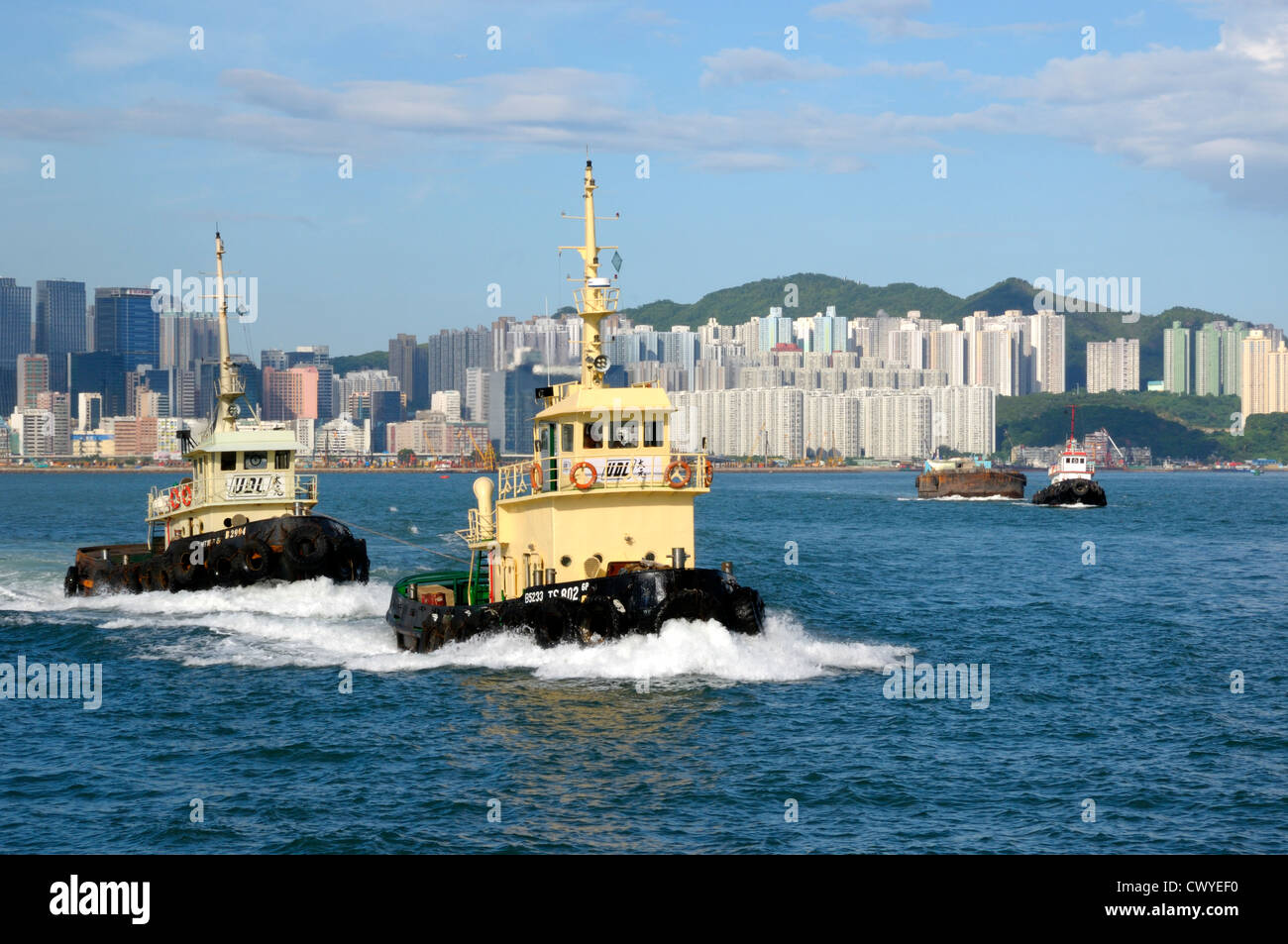 Tug boats on Victoria Harbour, Hong Kong Stock Photo - Alamy