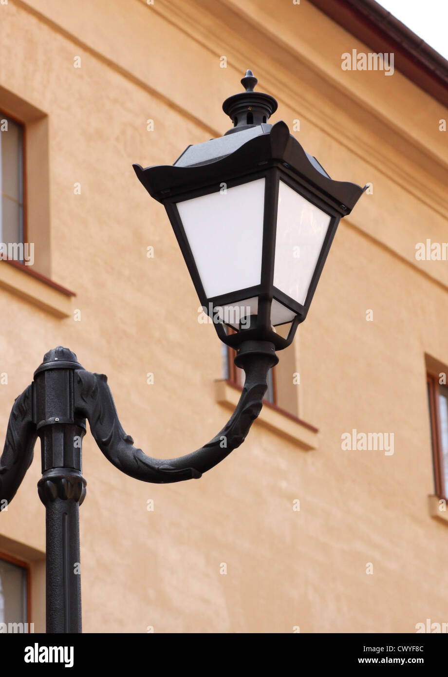 retro street lamp in front of building Stock Photo - Alamy