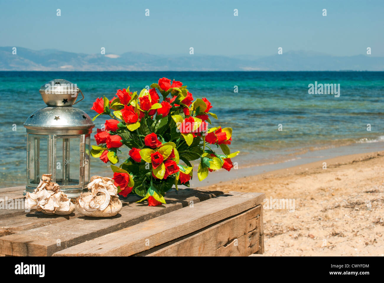 Wedding bouquet of roses on the beach Stock Photo - Alamy