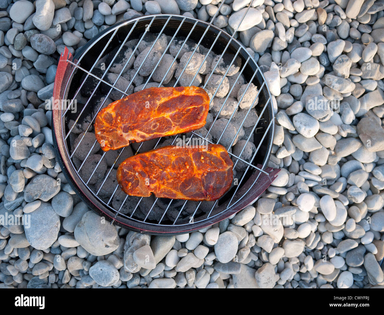Two steaks on grill Stock Photo - Alamy