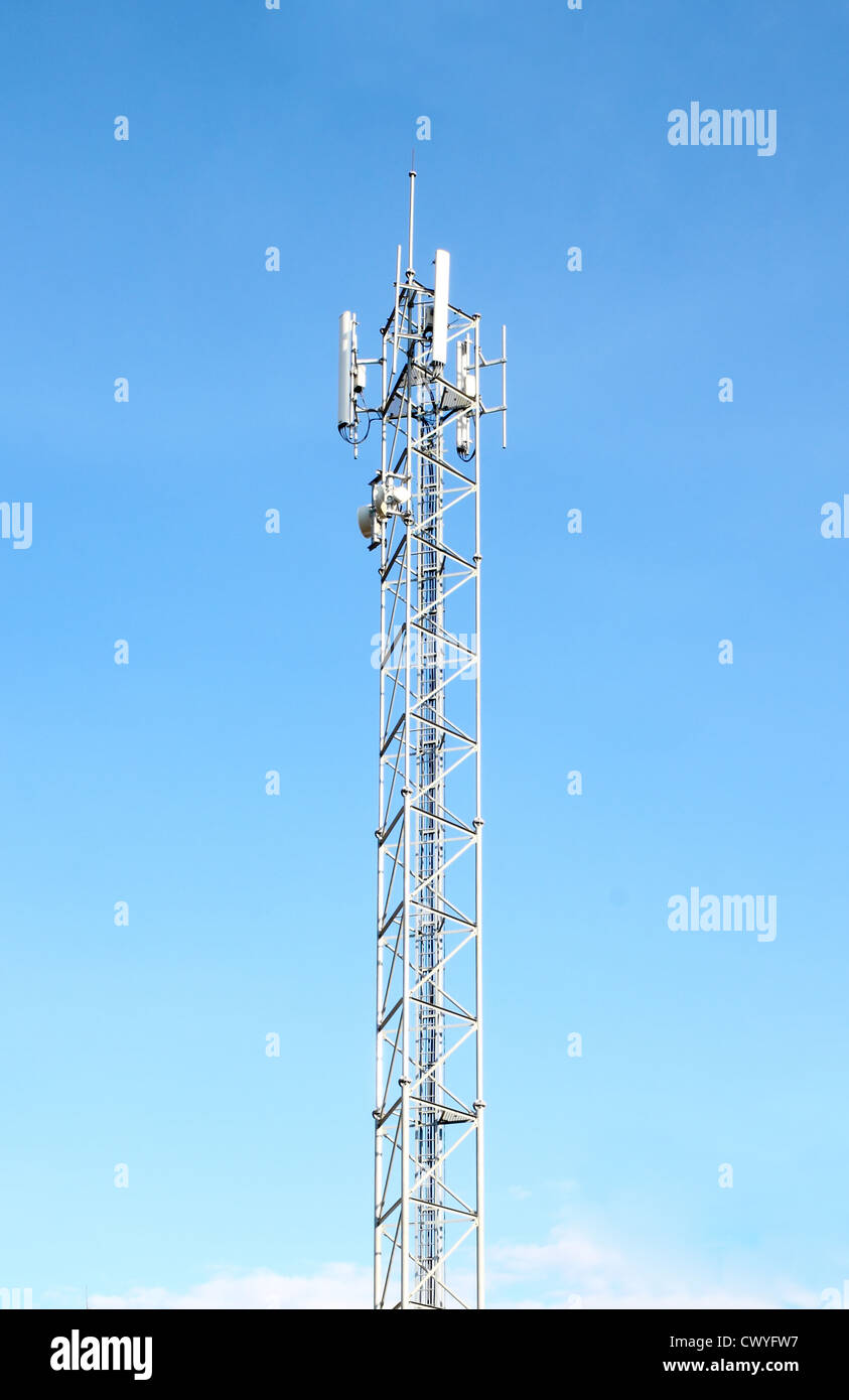 mobile telecommunication tower with blue sky background Stock Photo - Alamy