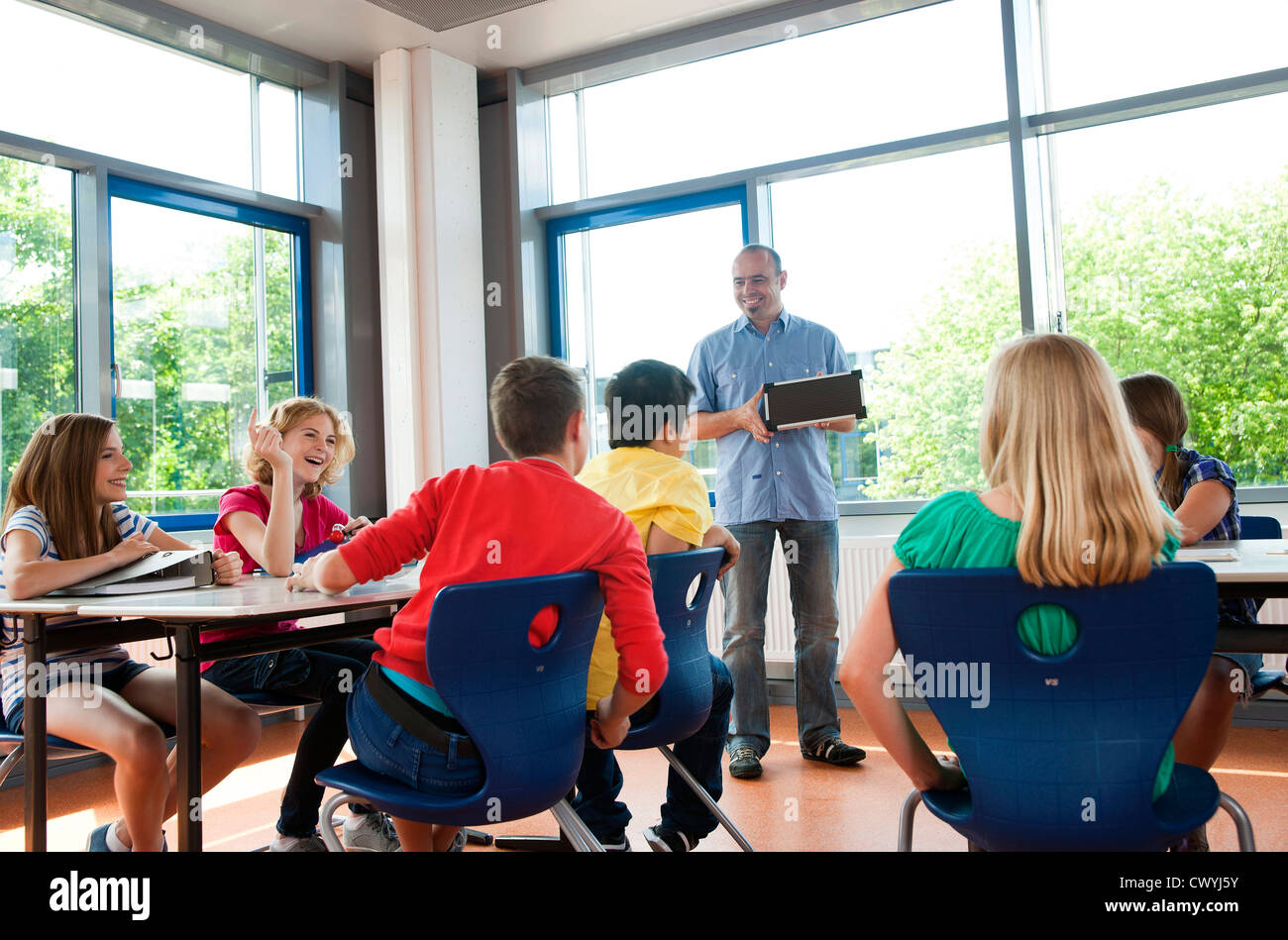 Teacher explaining solar panel in class Stock Photo - Alamy