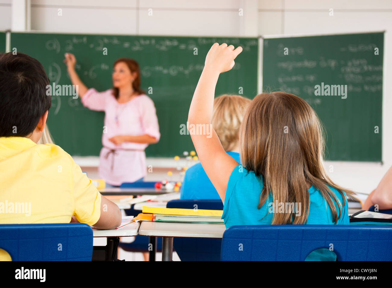 Female raised hand girl hi-res stock photography and images - Alamy