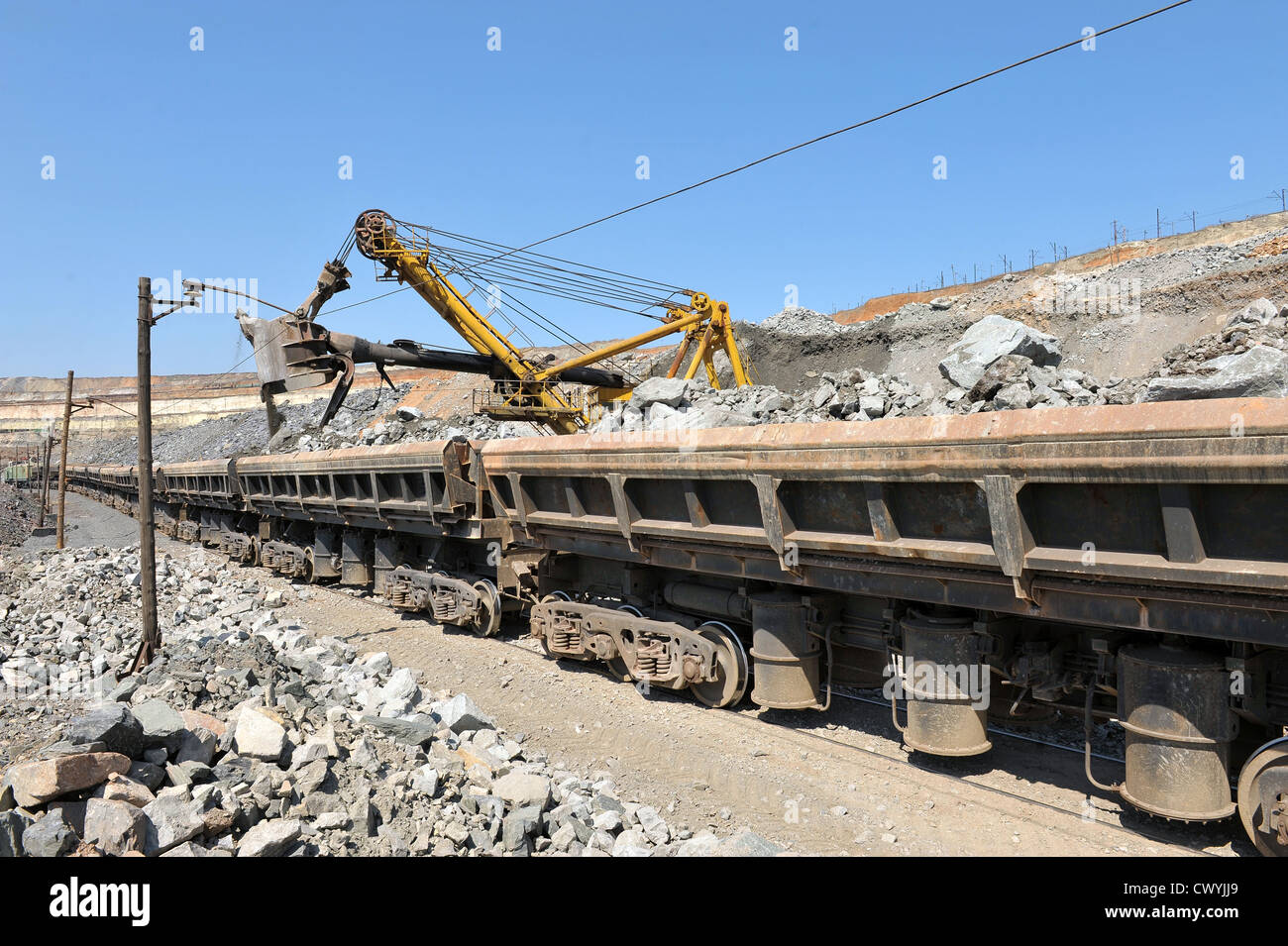 loading of iron ore railways in the career Stock Photo - Alamy