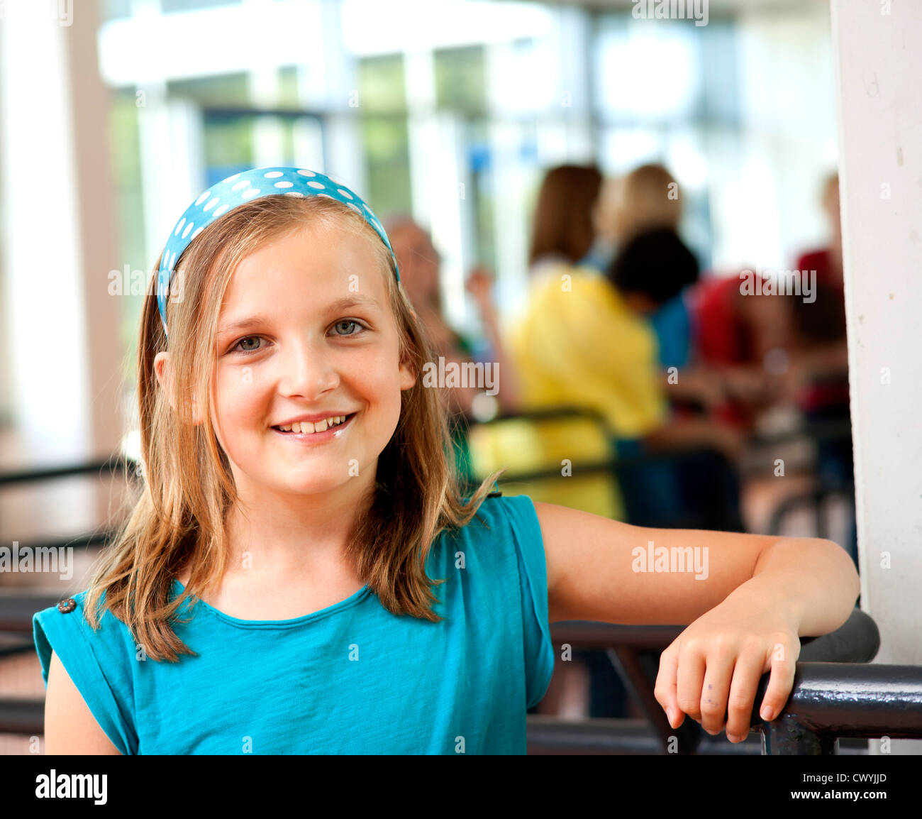 Smiling girl in school, portrait Stock Photo - Alamy
