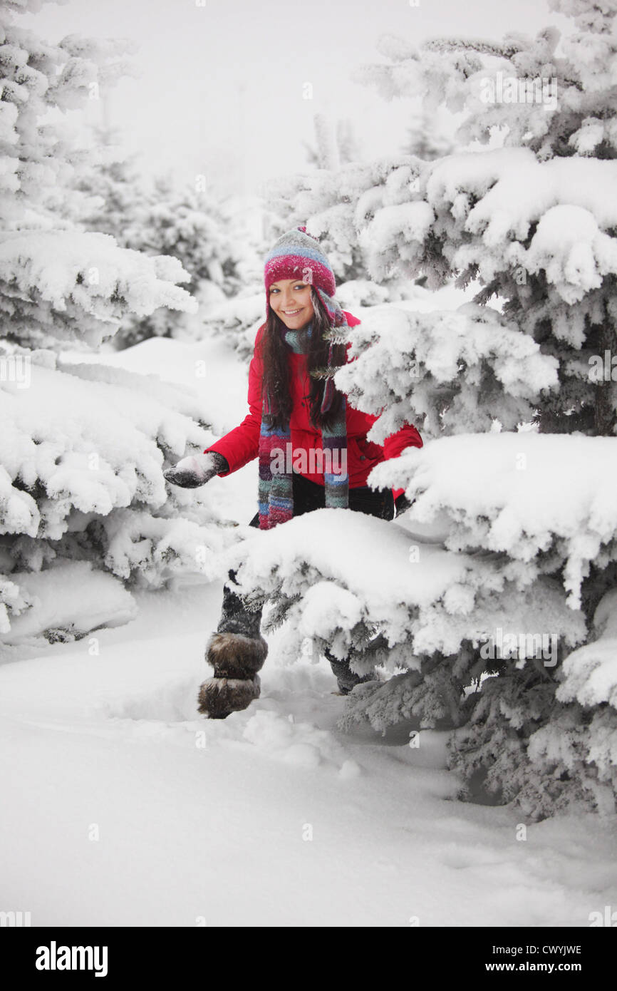 winter woman play snowballs on snow background Stock Photo - Alamy