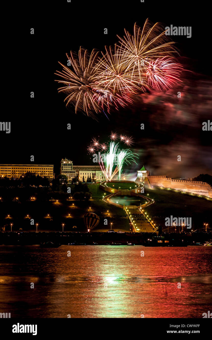 Colorful Fireworks over river Stock Photo - Alamy