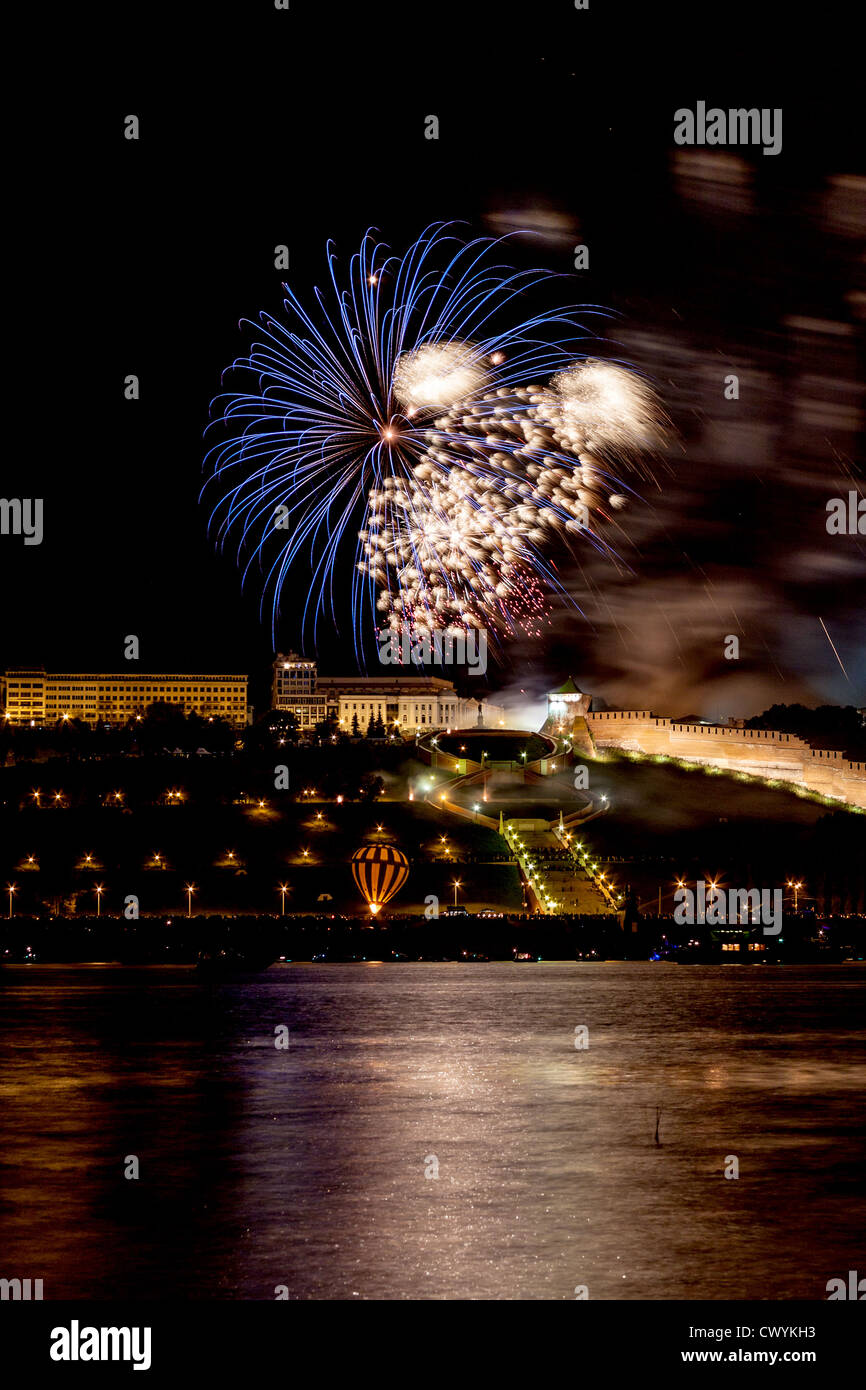 Colorful Fireworks over river Stock Photo - Alamy