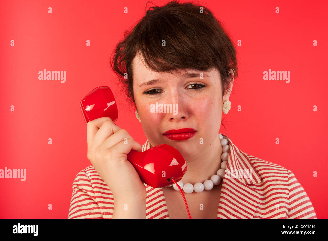 Woman crying while having a sad phone call Stock Photo - Alamy