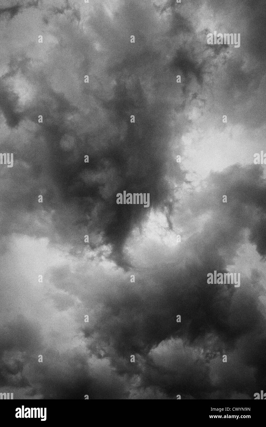 Monochromatic, film-like grainy view of storm clouds forming Stock ...