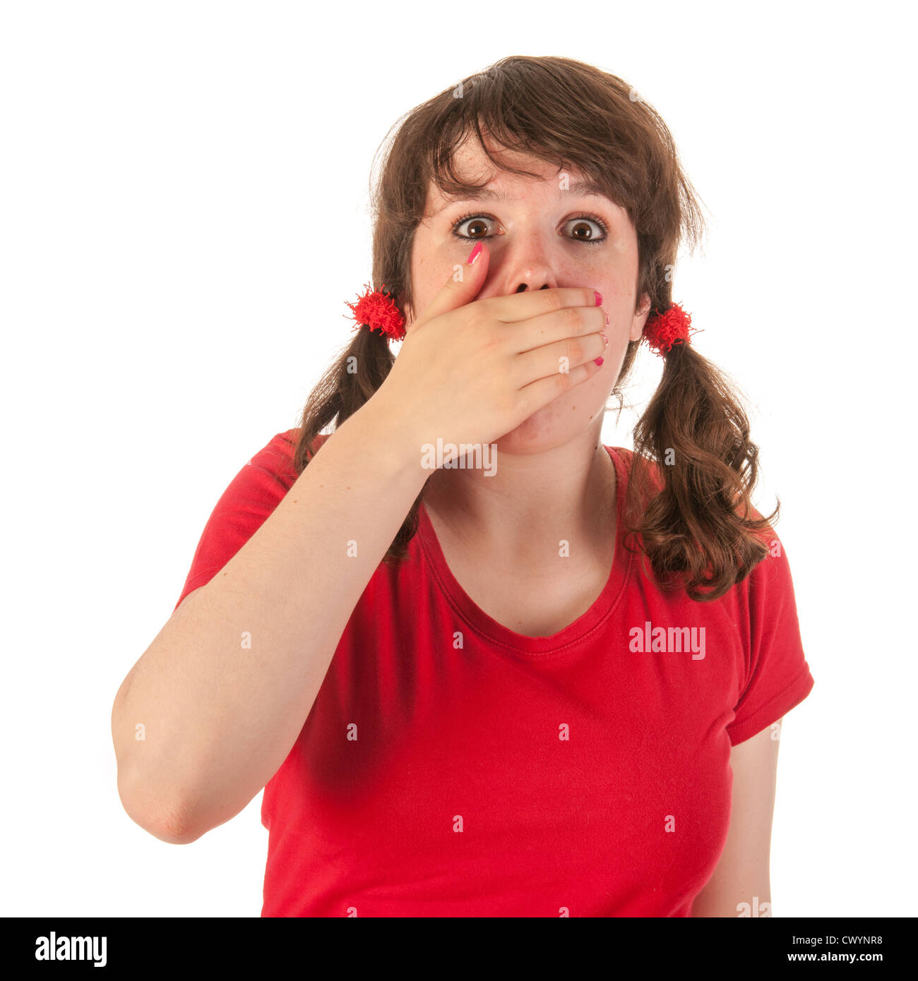 Portrait of a young teen girl in red having fear Stock Photo - Alamy