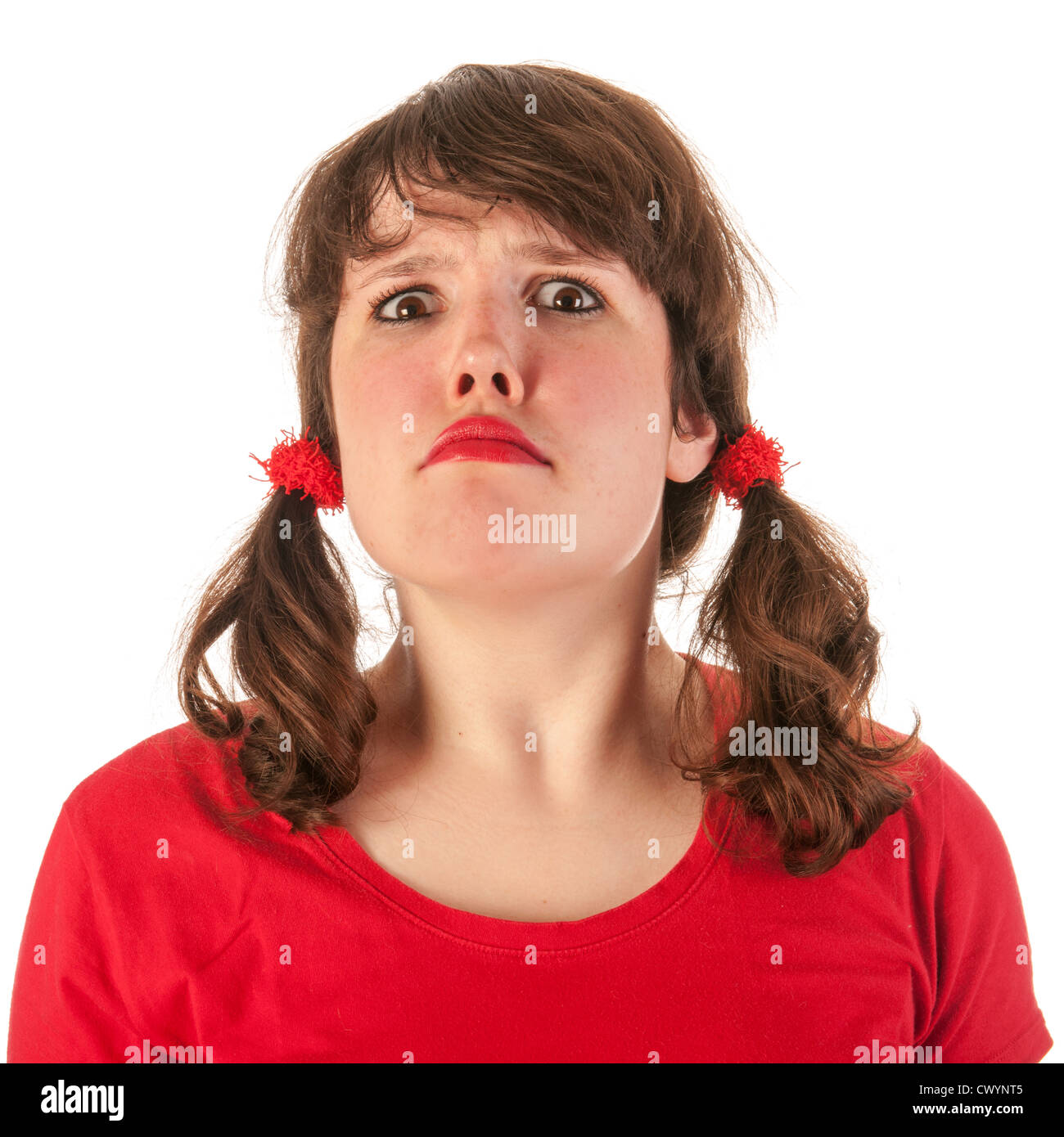 Portrait of an angry young teen girl in red Stock Photo - Alamy
