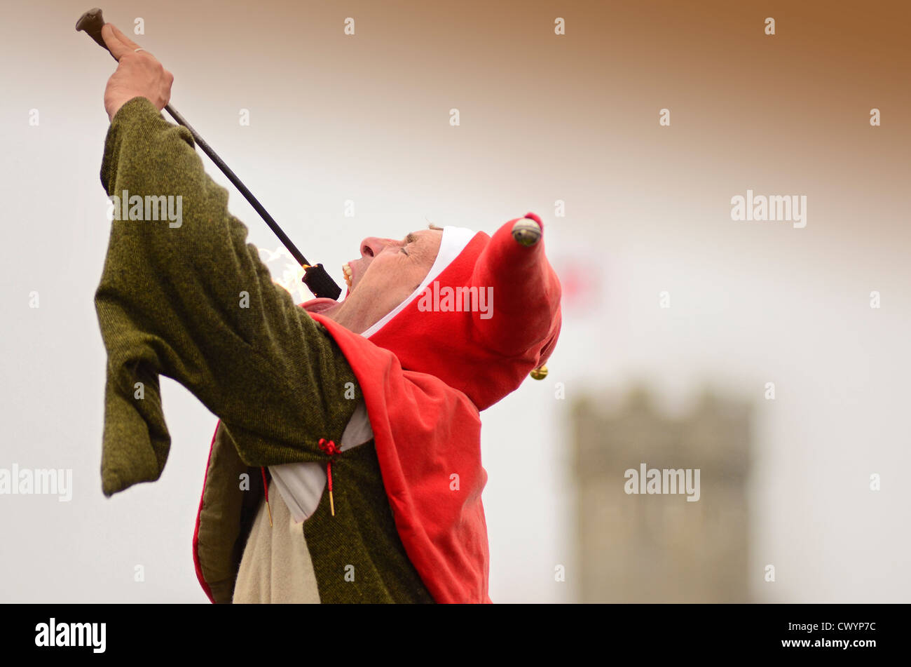 Fool or Jester swallowing fire at medieval joust day Pendennis Castle ...