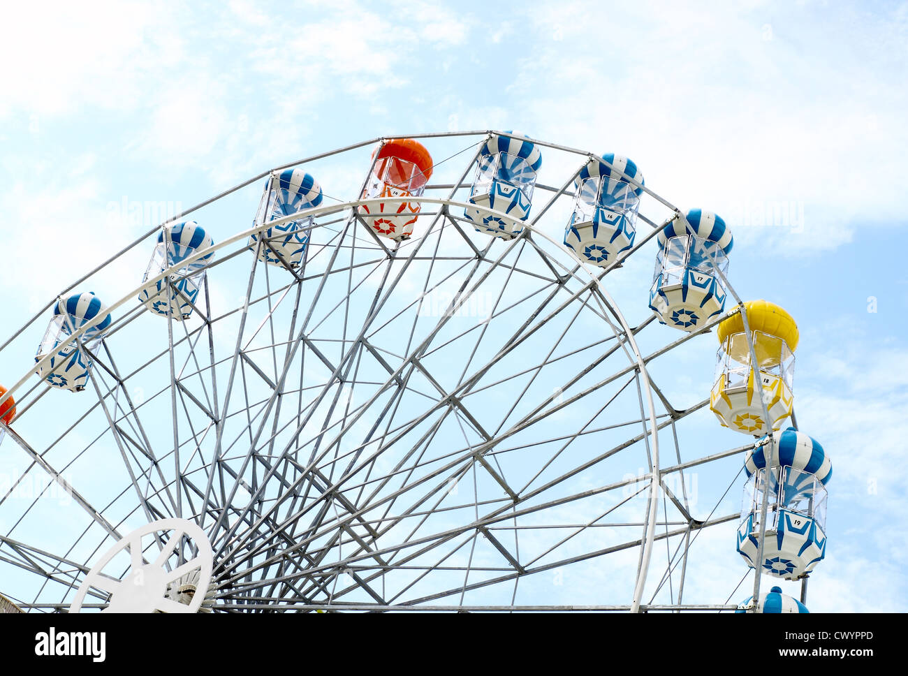 colored Ferris wheel with sky background Stock Photo - Alamy