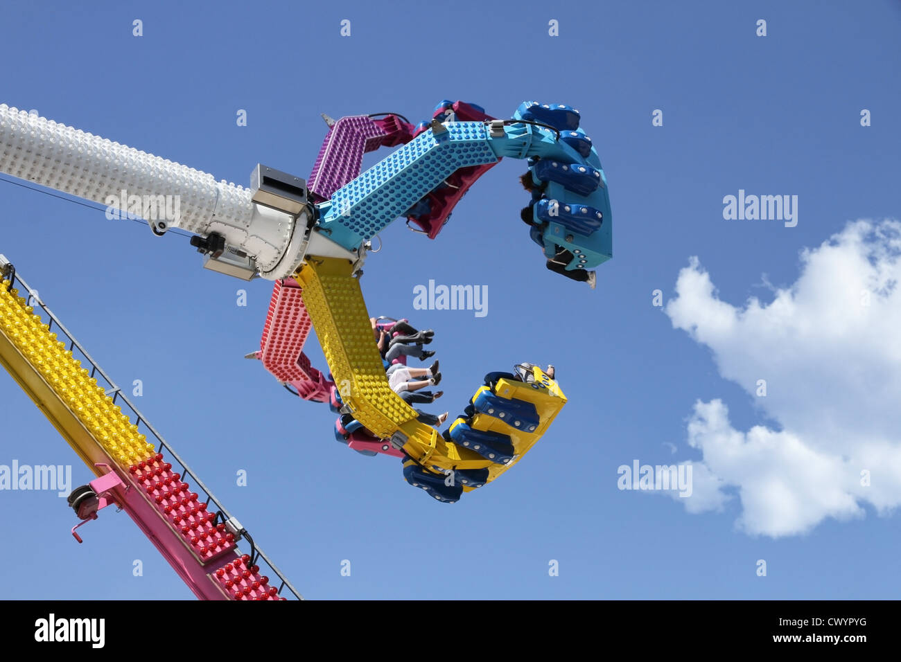 amusement park ride against blue sky Stock Photo - Alamy