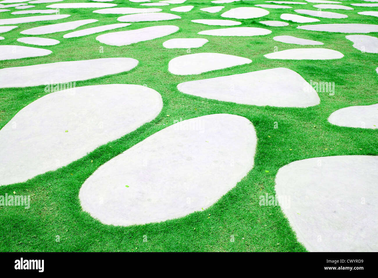 stone walk way with grass field Stock Photo - Alamy