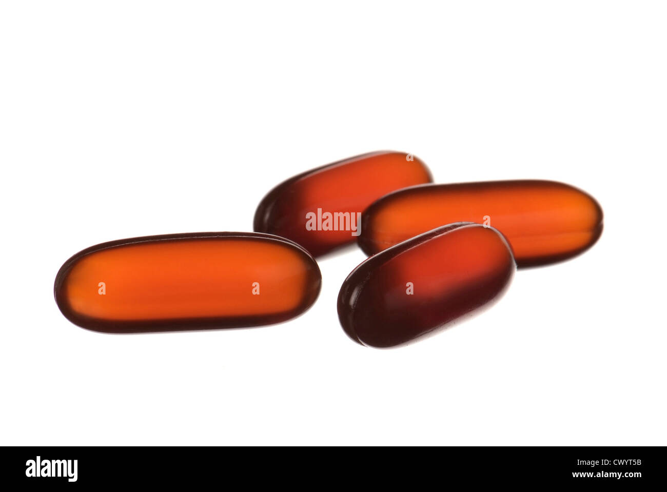 Isolated orange pills Cut Out Stock Images & Pictures - Alamy