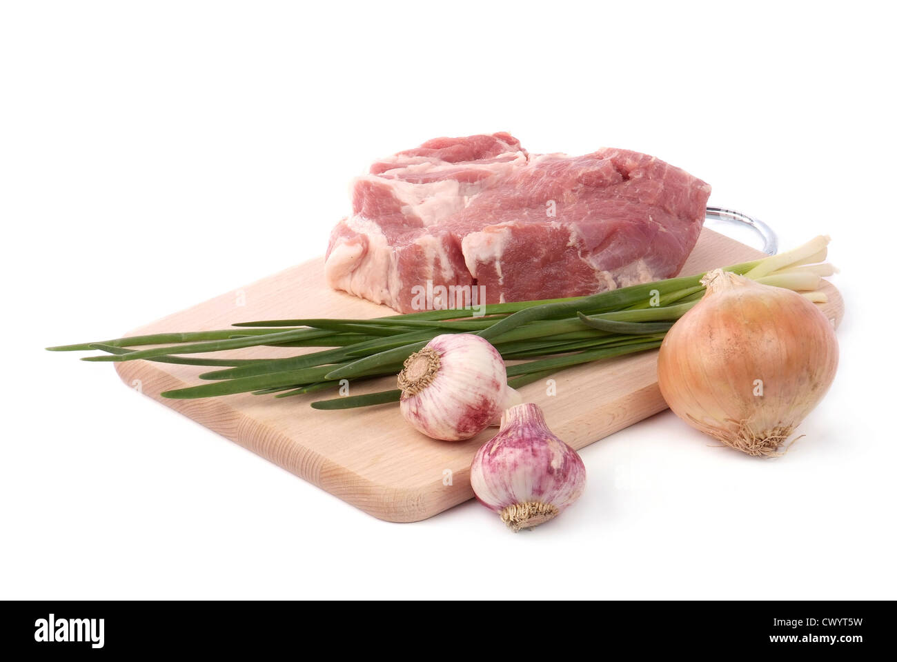 raw meat with onion and garlic isolated on white Stock Photo - Alamy