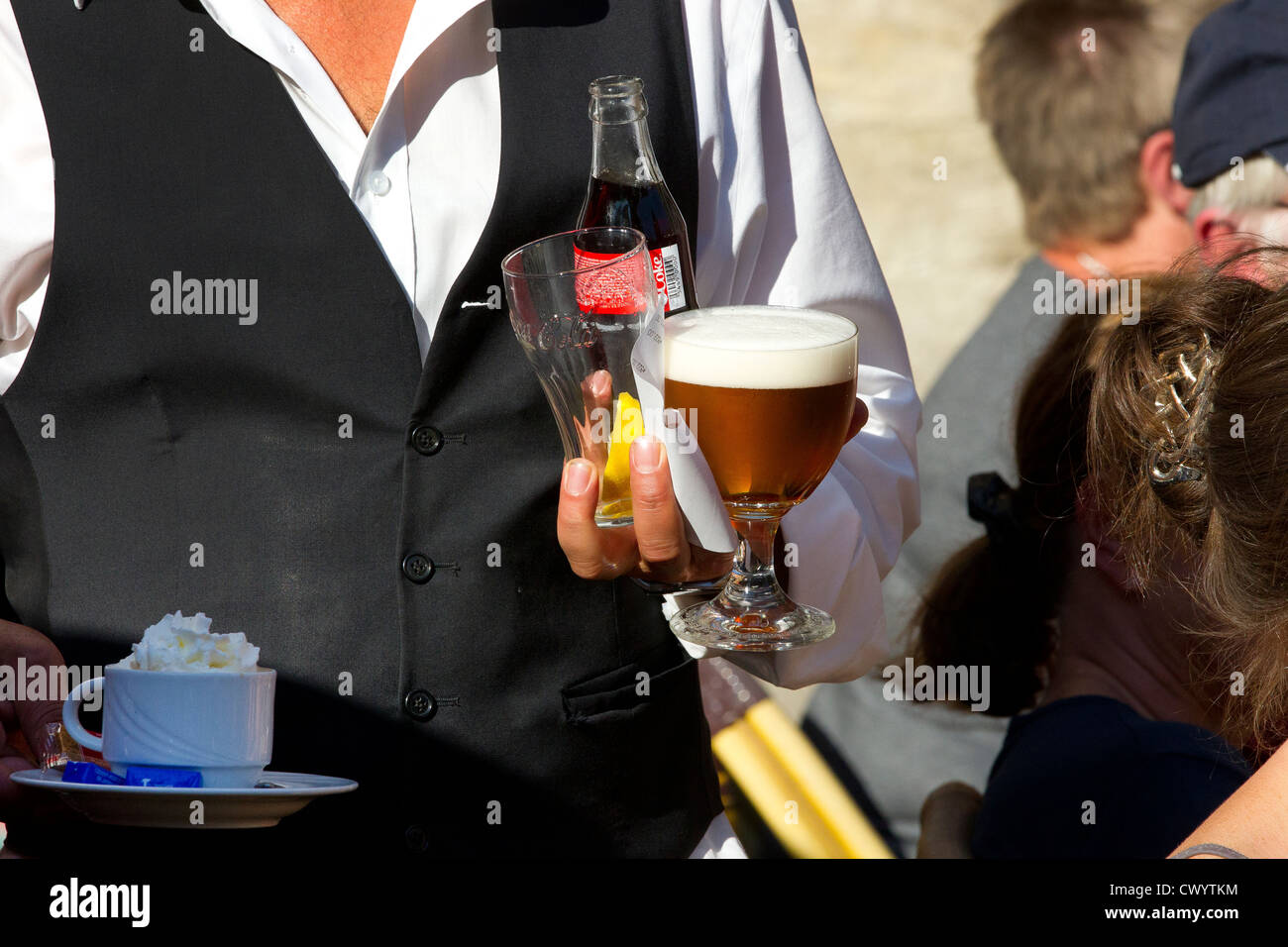 waiter serving pouring glass belgian beer belgium Stock Photo - Alamy