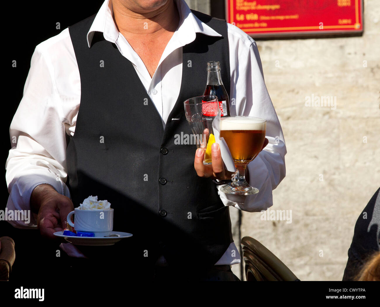 waiter serving pouring glass belgian beer belgium Stock Photo - Alamy