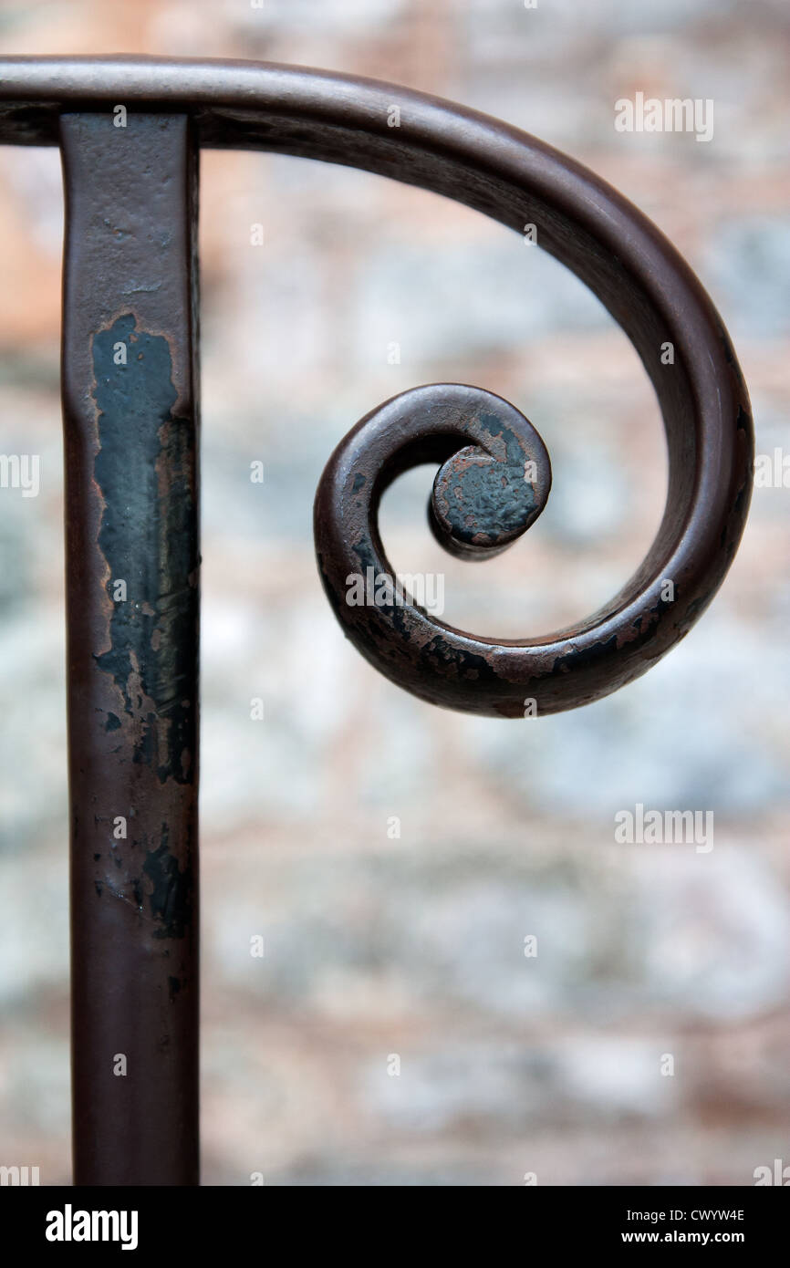 Close up of the spiral at end of handrail Stock Photo - Alamy