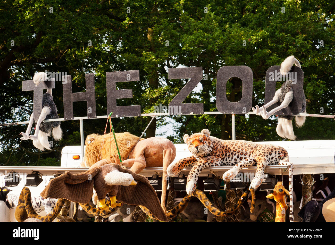 The Zoo sign with stuffed animal toys on top of a funfair stall Stock ...