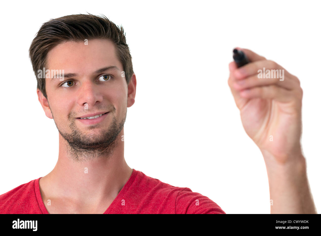 Young man with red t-shirt writing with permanent marker Stock Photo ...