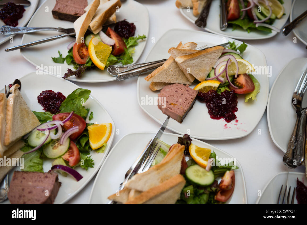 Plates of pate and toast, the starter course at a wedding reception ...