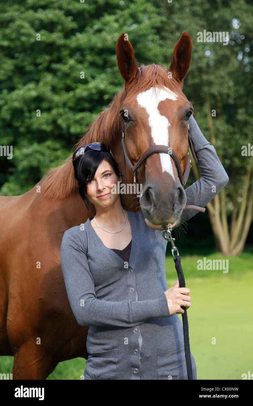 Young woman hugs horse hi-res stock photography and images - Alamy