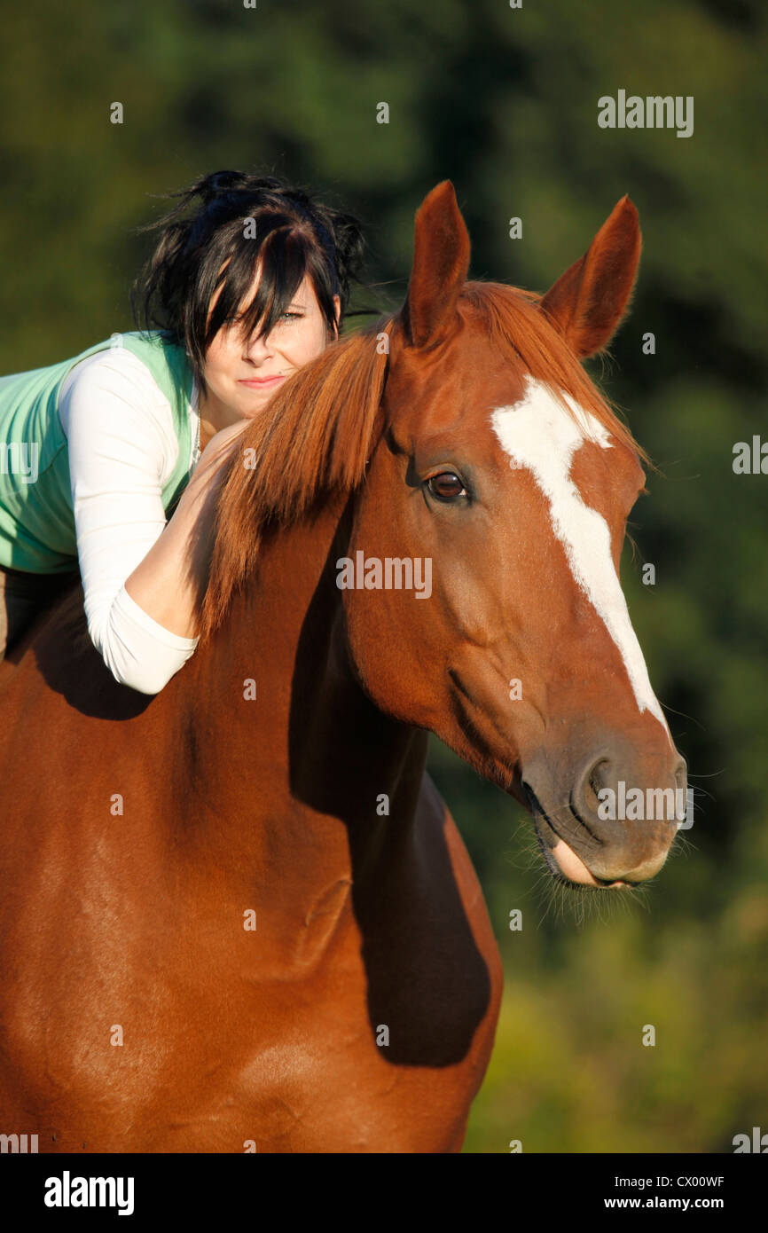 young woman with mare Stock Photo - Alamy