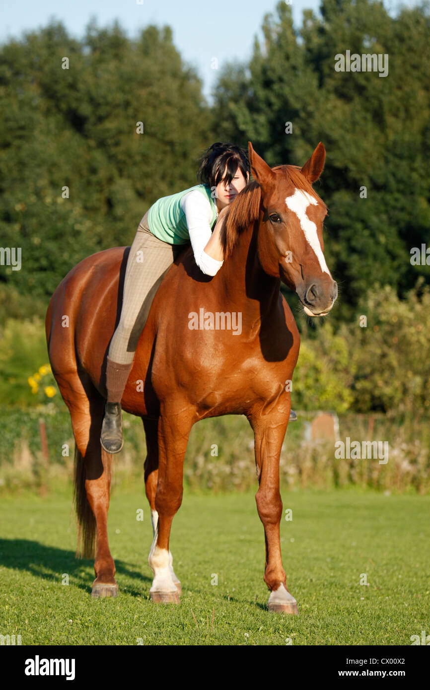 young woman with mare Stock Photo - Alamy