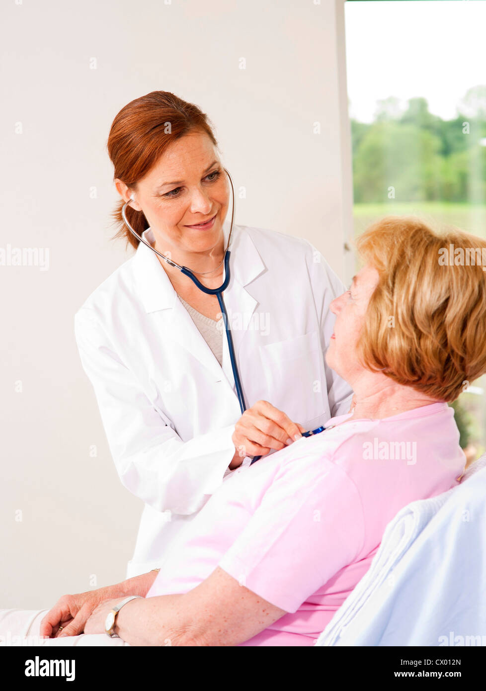 Female patient at female doctor Stock Photo - Alamy