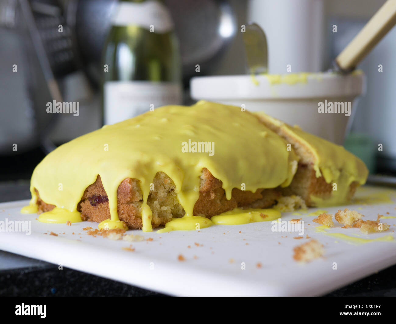 Home made cakes with yellow sticky icing top Stock Photo - Alamy
