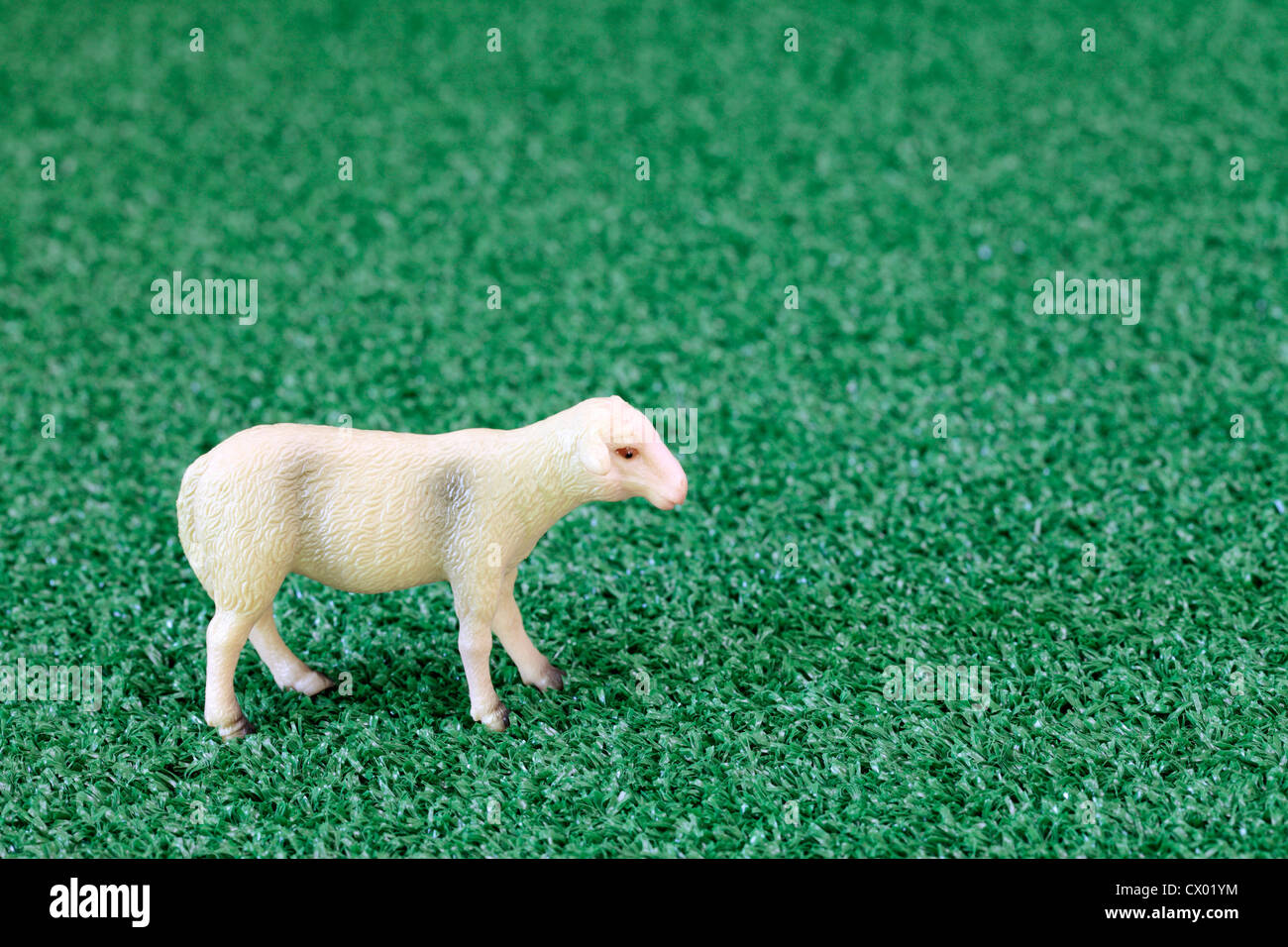 Plastic Sheep on Fake Artificial Grass Stock Photo - Alamy