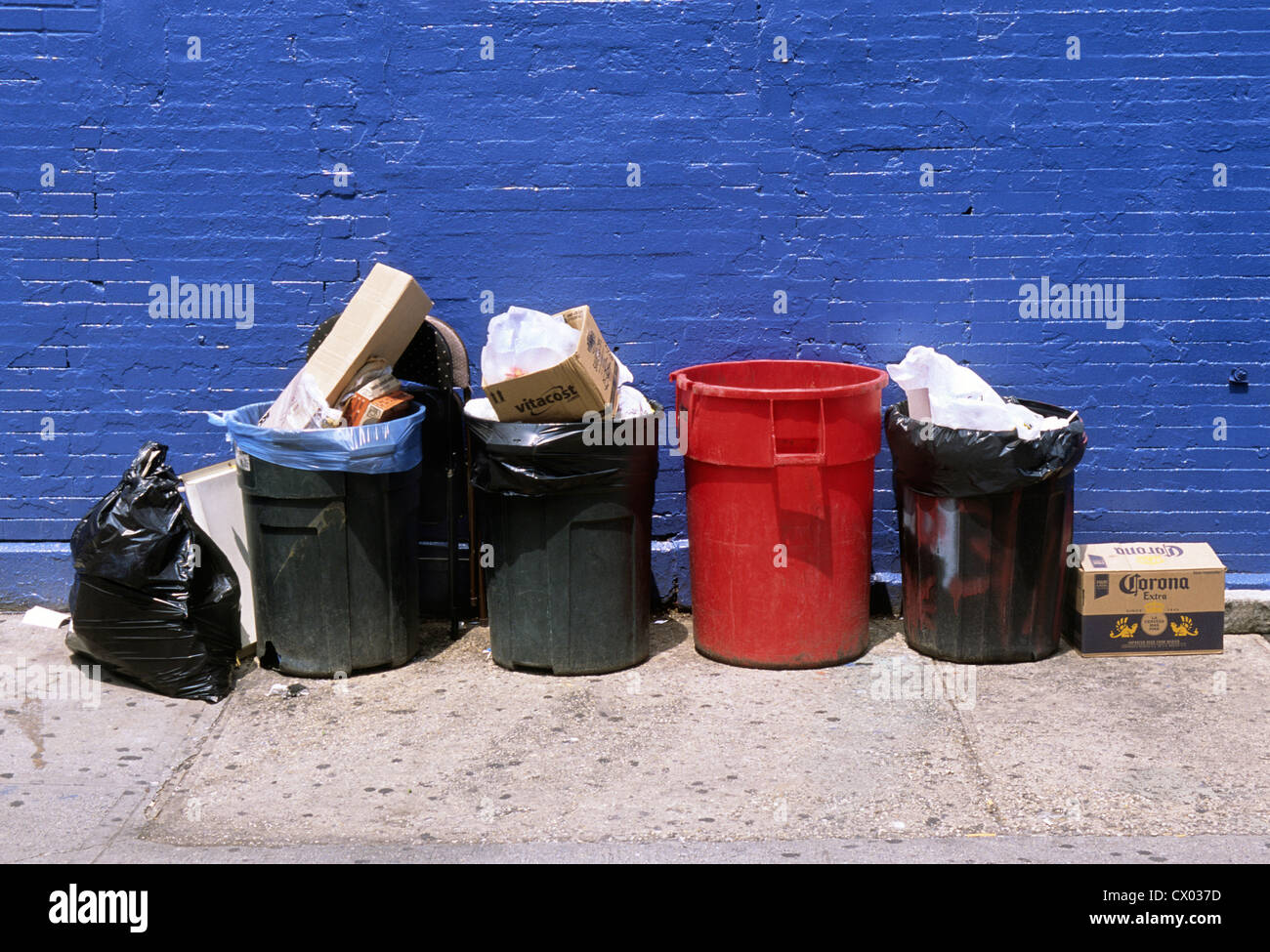 Garbage bins on the street. Trashcans lined up for collection on New ...