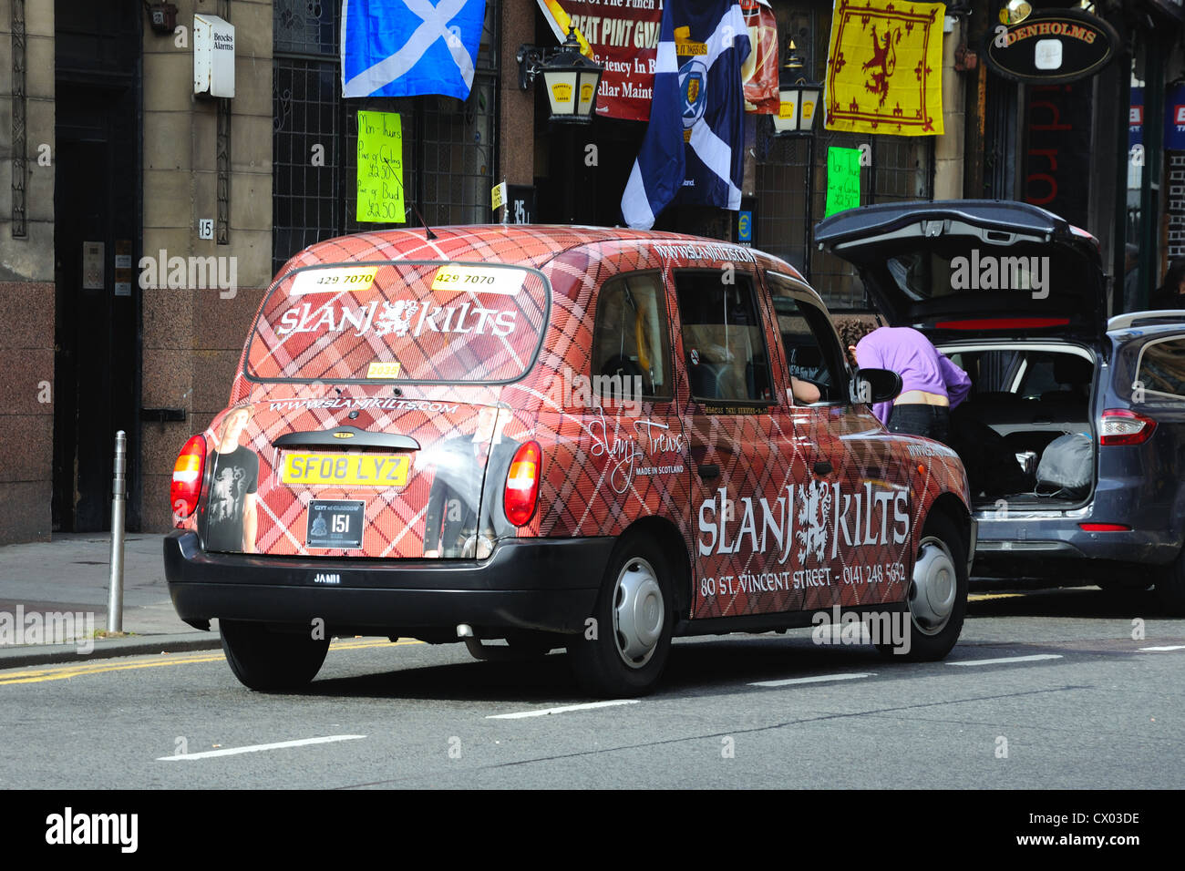 A tartan taxi and Scottish flags compliment each other on Hope Street ...