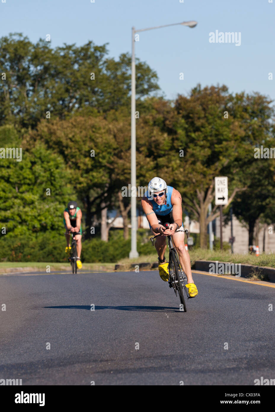 Bicycle racer turning a corner - USA Stock Photo - Alamy