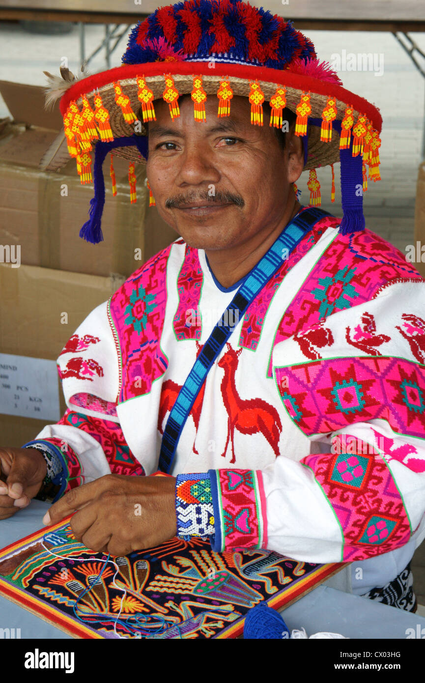 Huichol Indian artisan from Nayarit, Mexico, working on a traditional ...