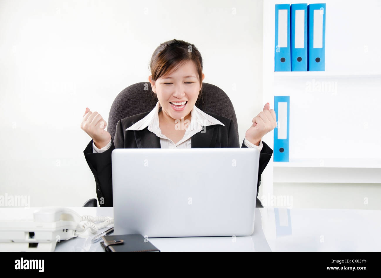 Business person showing her excitement Stock Photo - Alamy