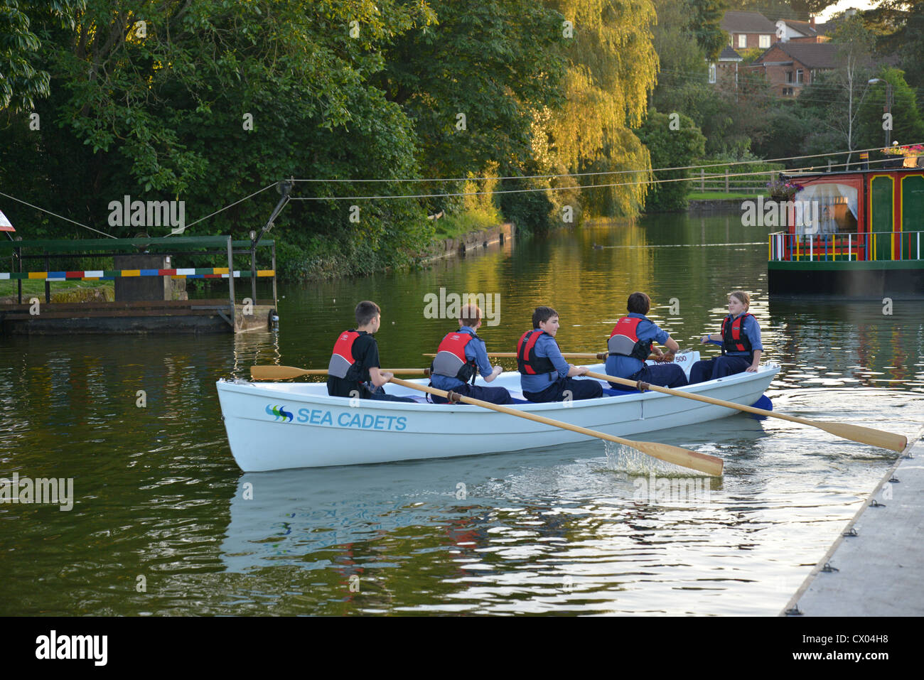 Sea Cadets in rowing boat, Tiverton Canal, Tiverton, Devon, England ...