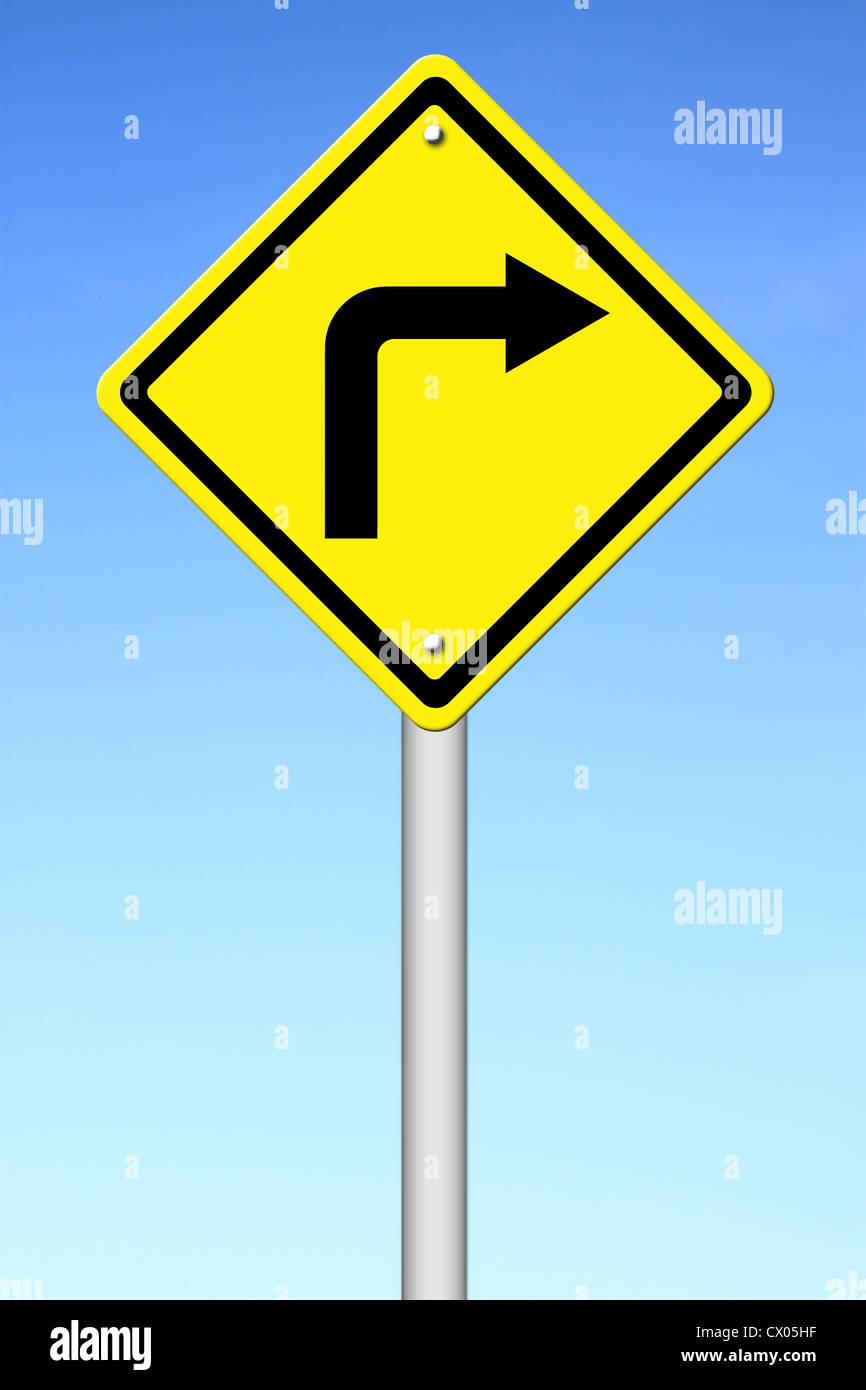 Road Sign - Right Turn Warning with blue sky Stock Photo - Alamy