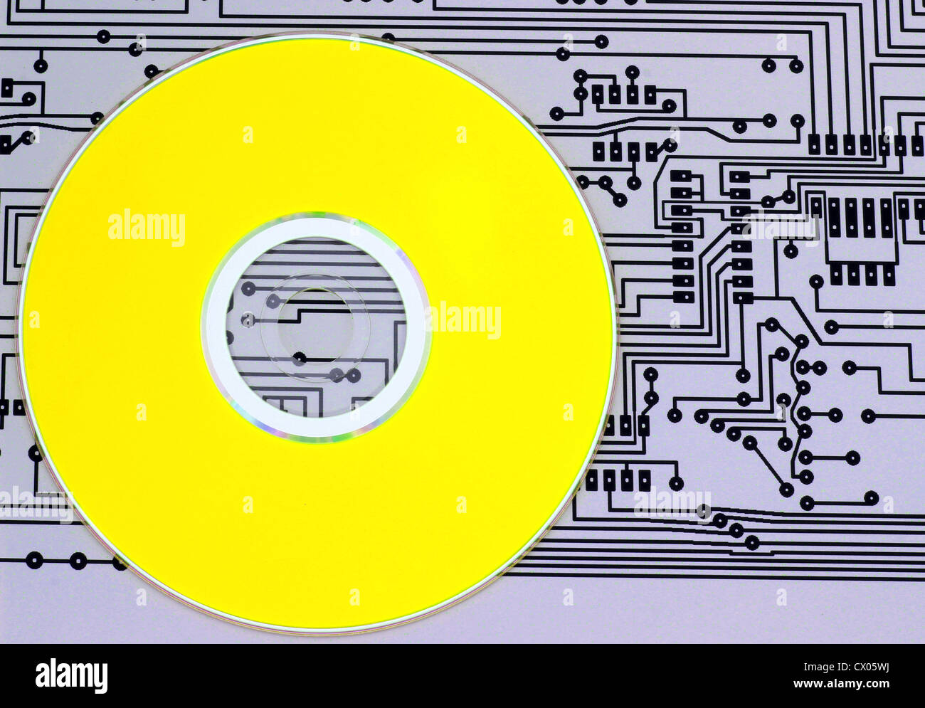 Orange DVD and electronic circuit board schema Stock Photo - Alamy