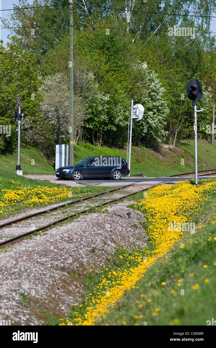 Car crossing railroad Stock Photo - Alamy