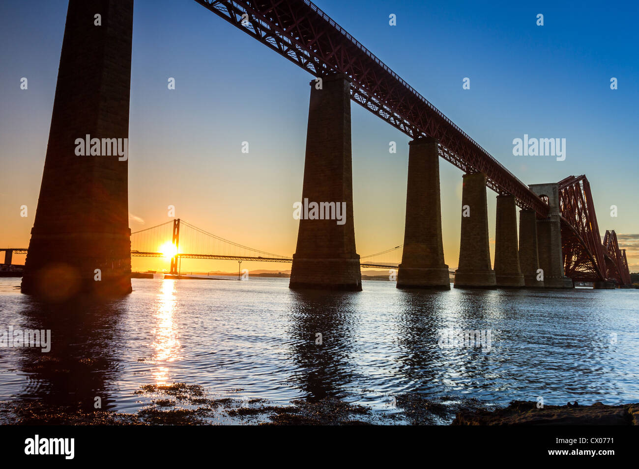 Sunset between the two bridges in Scotland Stock Photo - Alamy