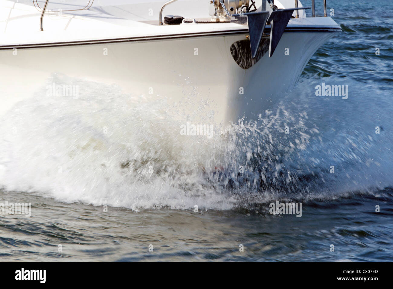 A luxury speedboat powering through the water Stock Photo - Alamy