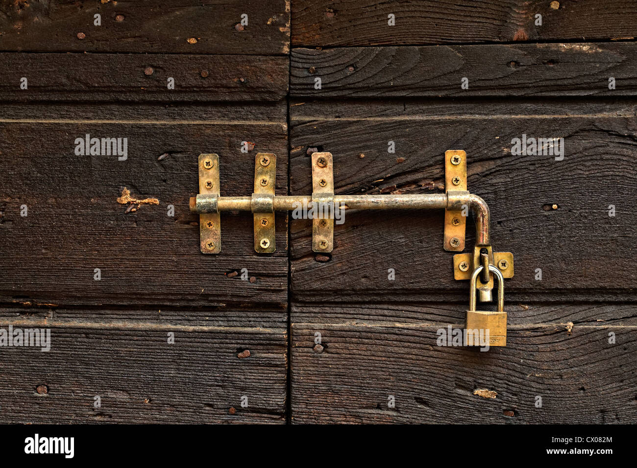Old latch and brass padlock hi-res stock photography and images - Alamy