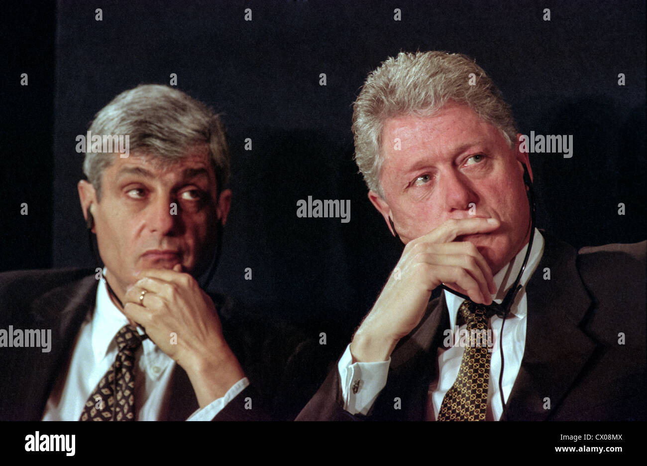 US President Bill Clinton (R) and US Treasury Secretary Robert Rubin ...